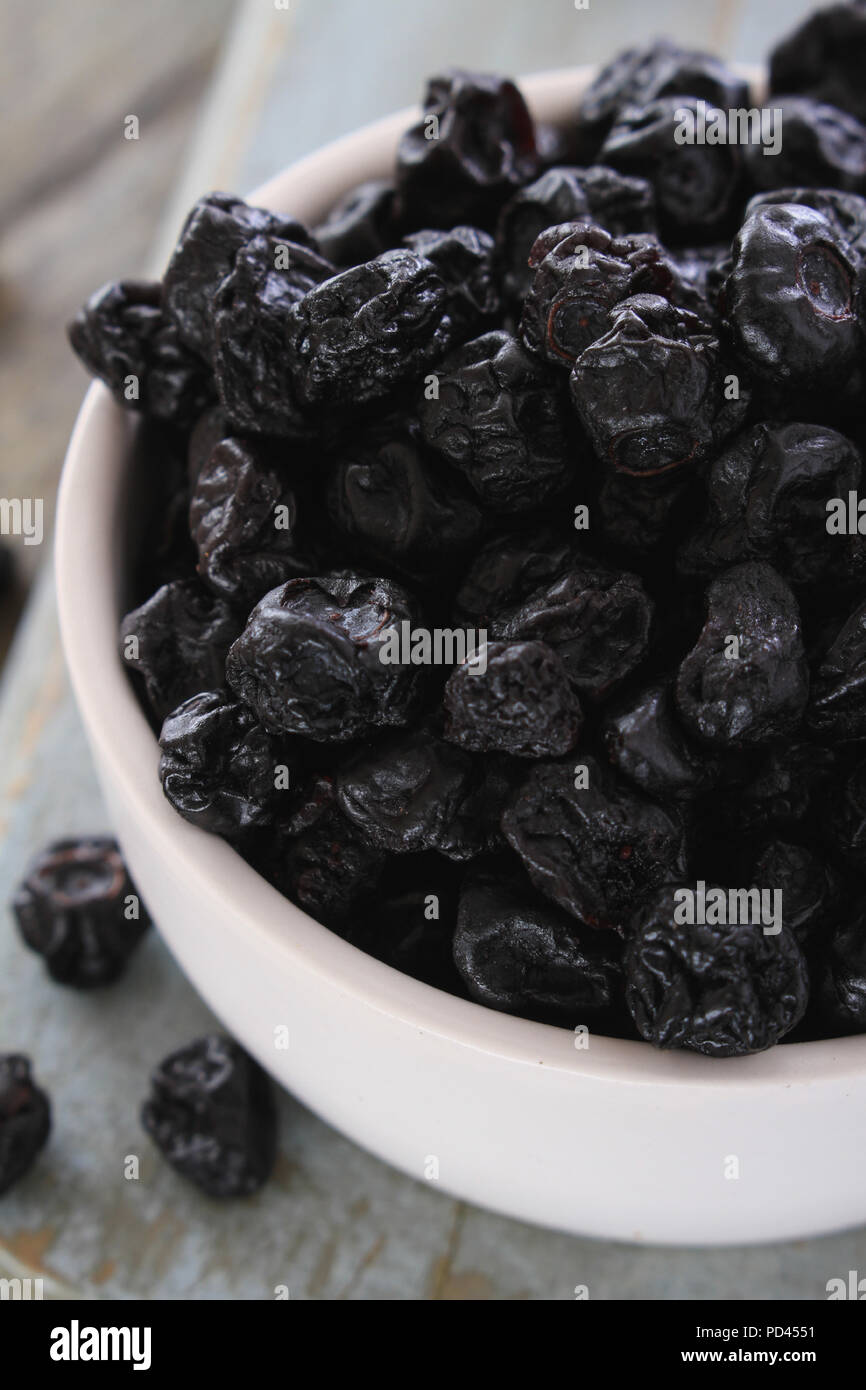 dried currants in dish Stock Photo - Alamy