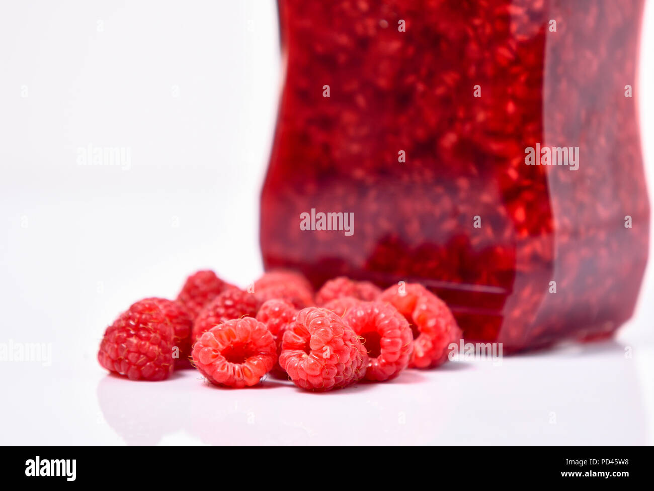 raspberry jam with raspberry isolated on white background Stock Photo ...