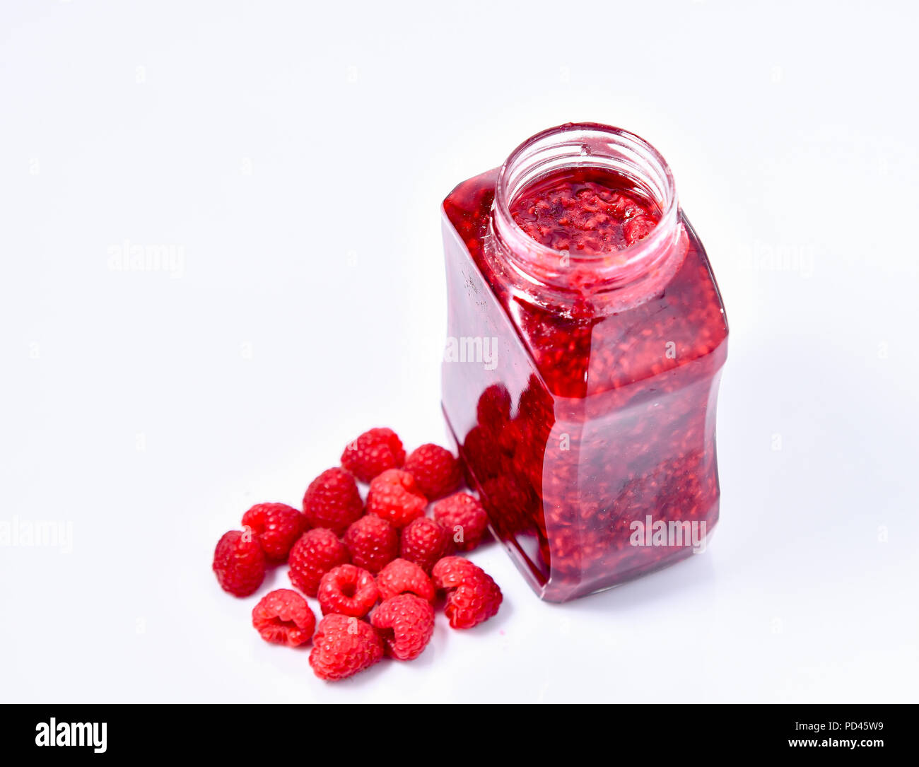 raspberry jam with raspberry isolated on white background Stock Photo ...