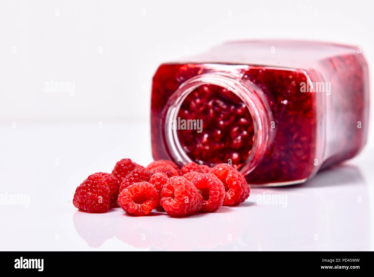 raspberry jam with raspberry isolated on white background Stock Photo ...
