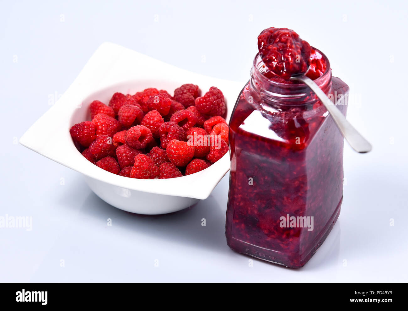 raspberry jam with raspberry isolated on white background Stock Photo ...