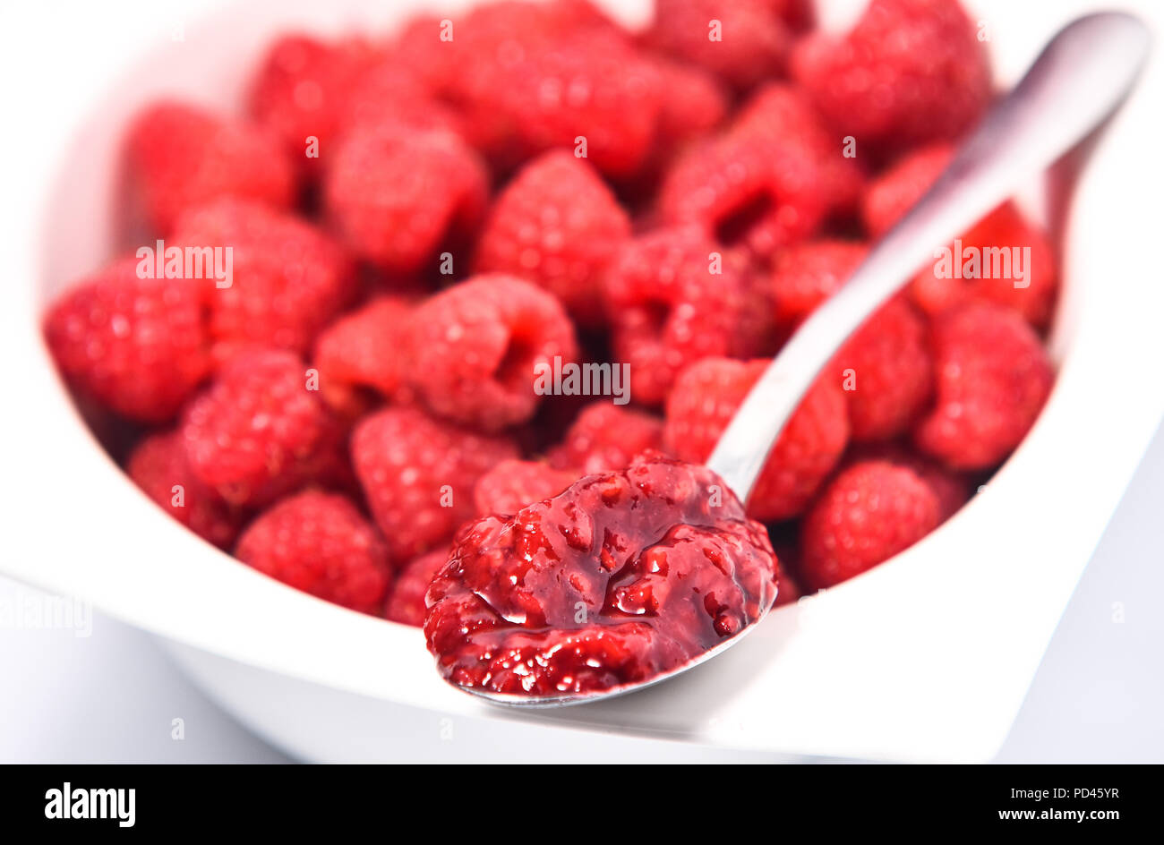 raspberry jam with raspberry isolated on white background Stock Photo ...