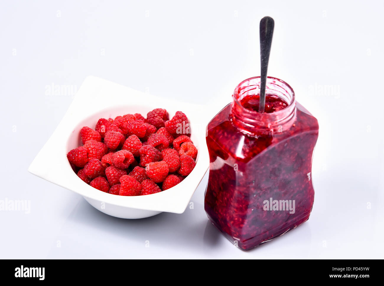 raspberry jam with raspberry isolated on white background Stock Photo ...