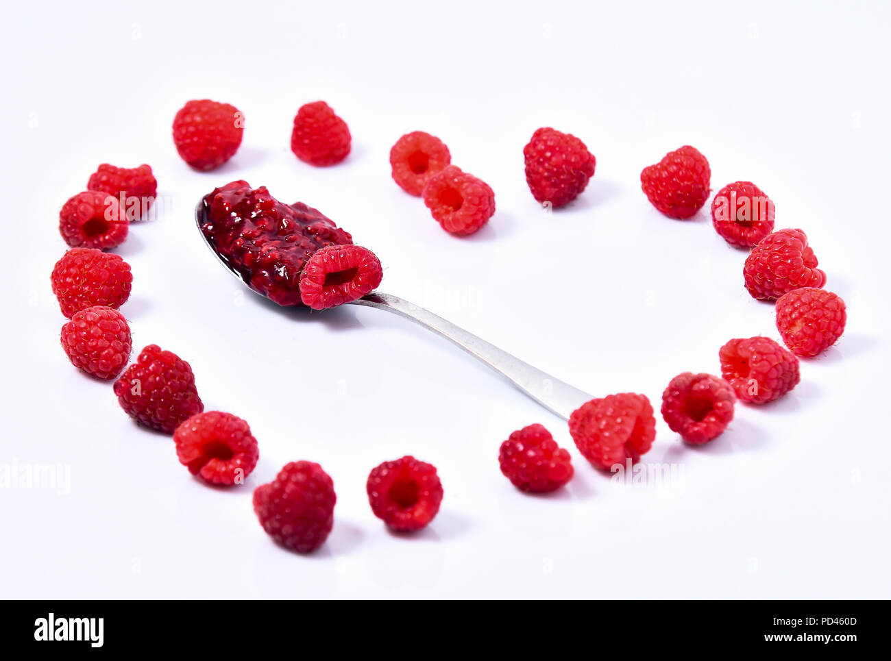 raspberry jam with raspberry isolated on white background Stock Photo ...