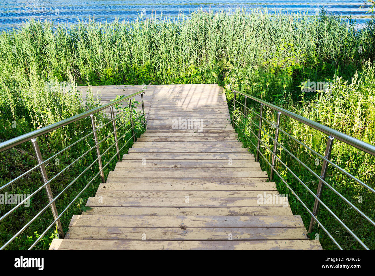 Wooden steps down to river hi-res stock photography and images - Alamy