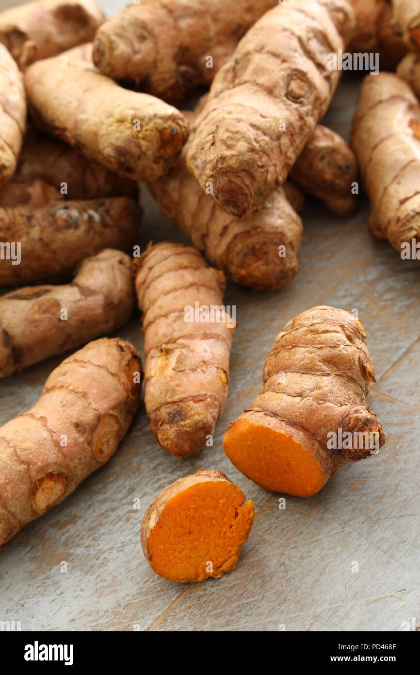 preparing fresh turmeric root Stock Photo - Alamy