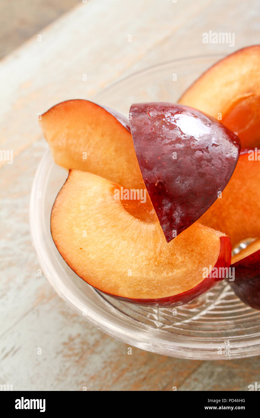 preparing fresh plums Stock Photo - Alamy