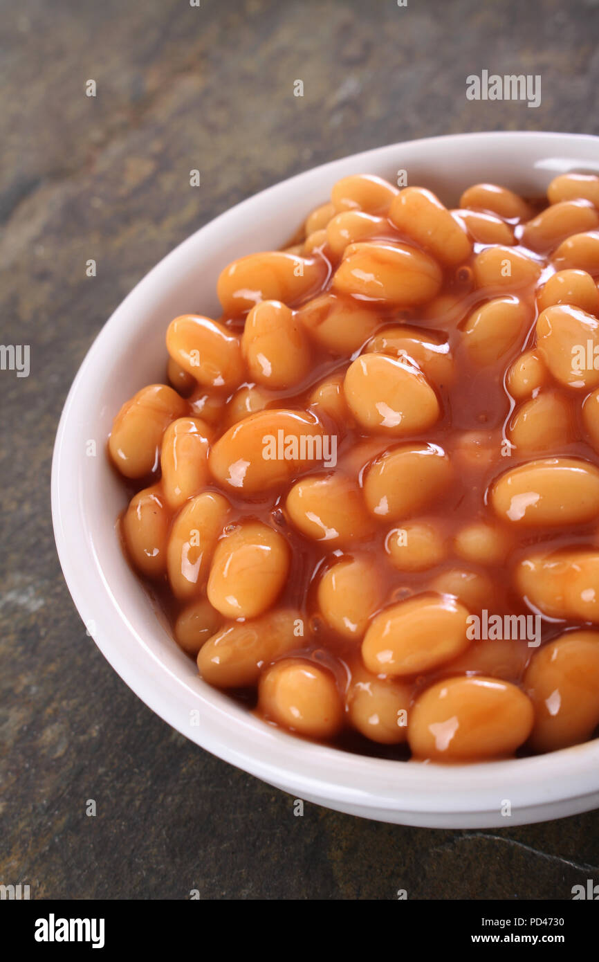 baked beans in tomato sauce in white dish Stock Photo - Alamy