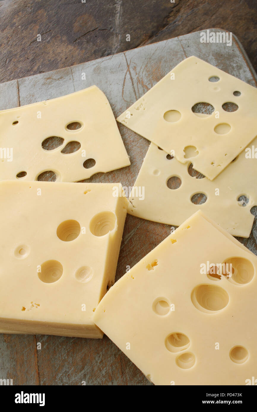 sliced cheese portions Stock Photo - Alamy