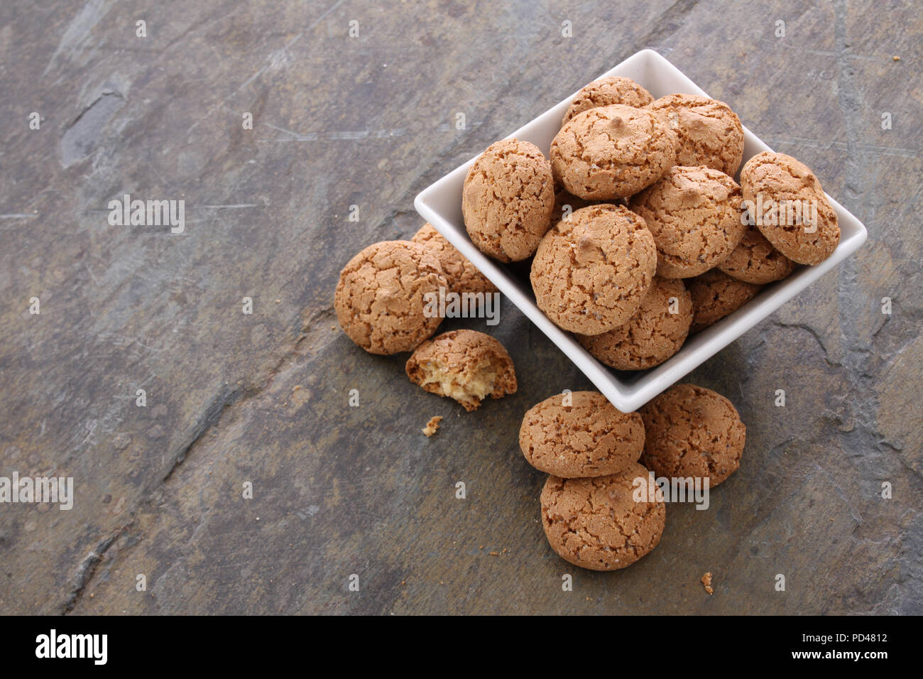 traditional ameretti biscuits in dish Stock Photo - Alamy