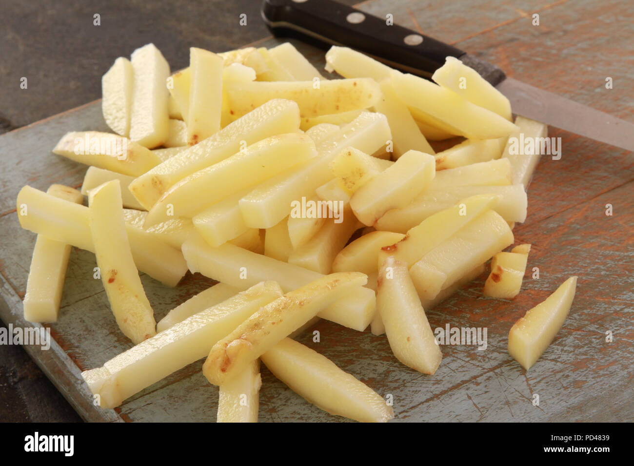 Chipping potatoes hi-res stock photography and images - Alamy