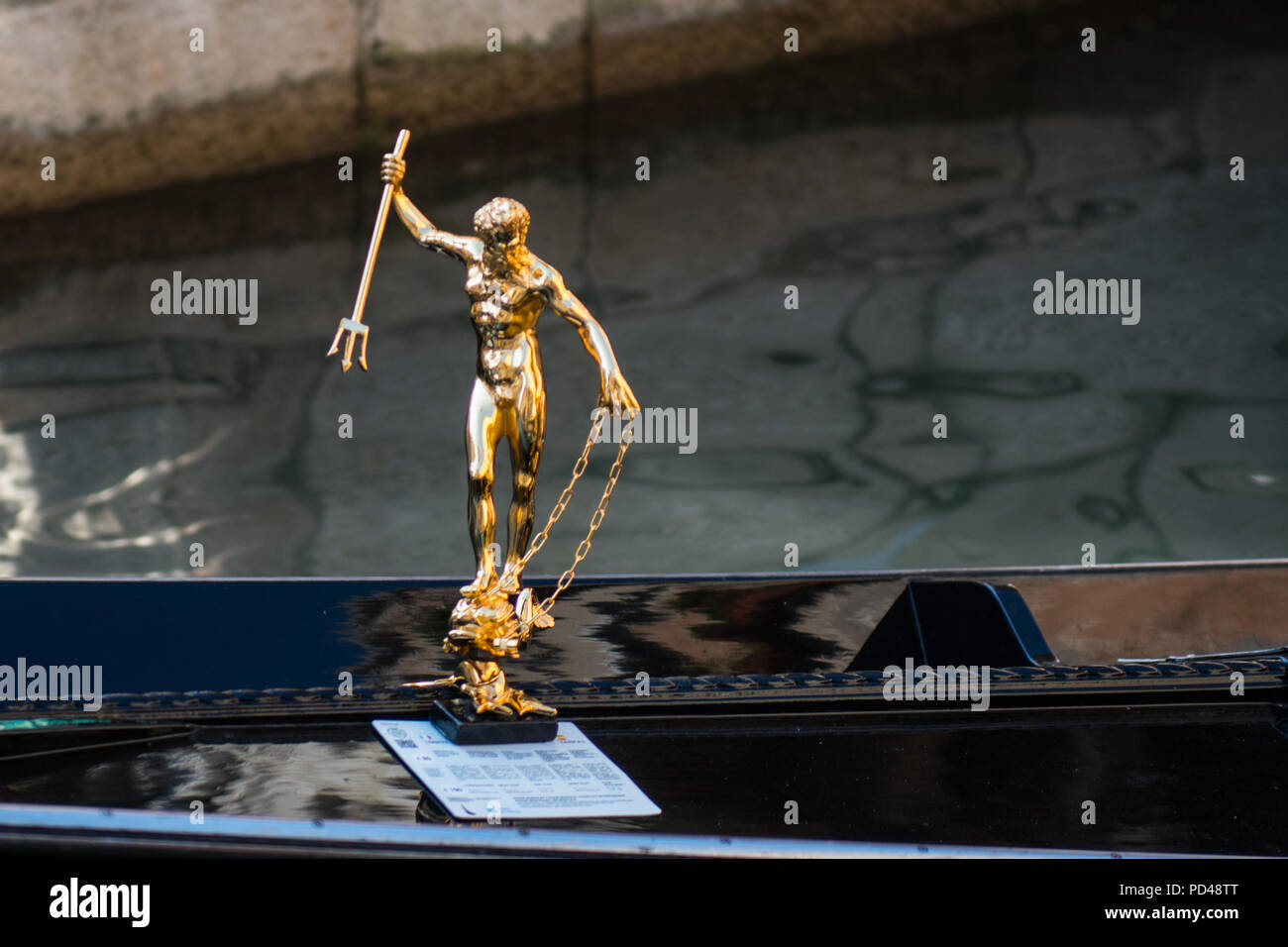 A golden decoration of the gondola, representing Poseidon Stock Photo ...