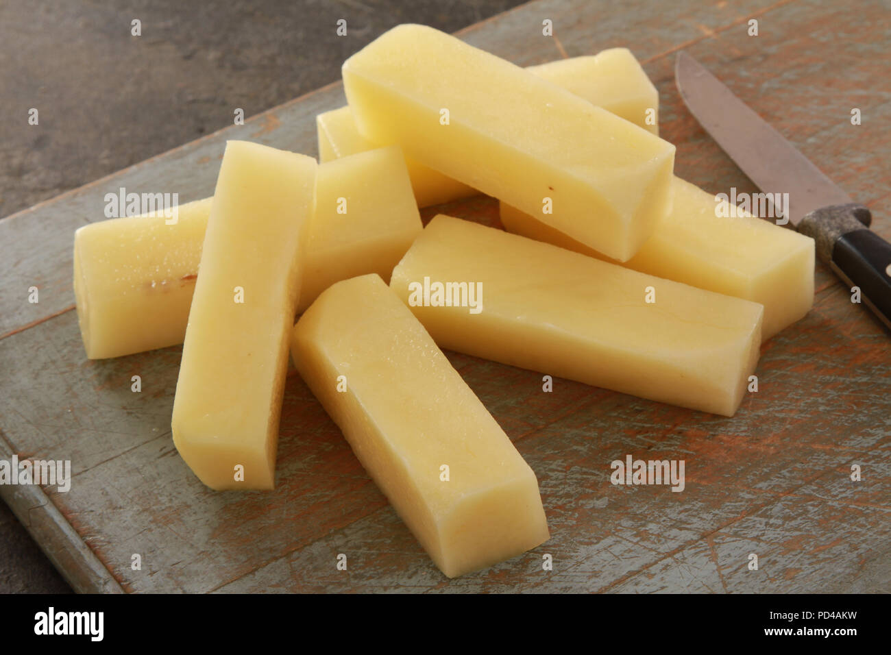 uncooked chipped potatoes Stock Photo - Alamy