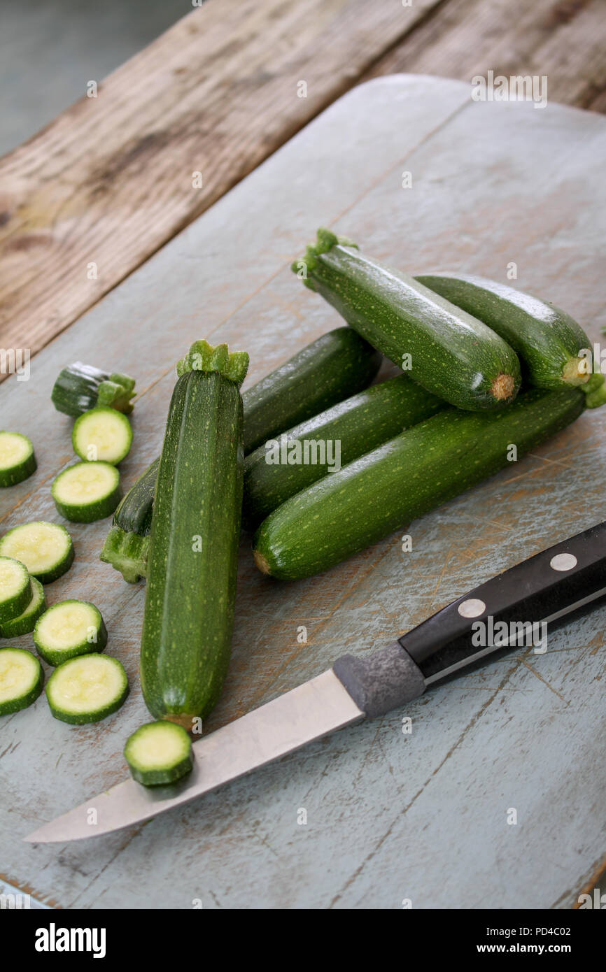 preparing fresh courgettes Stock Photo - Alamy