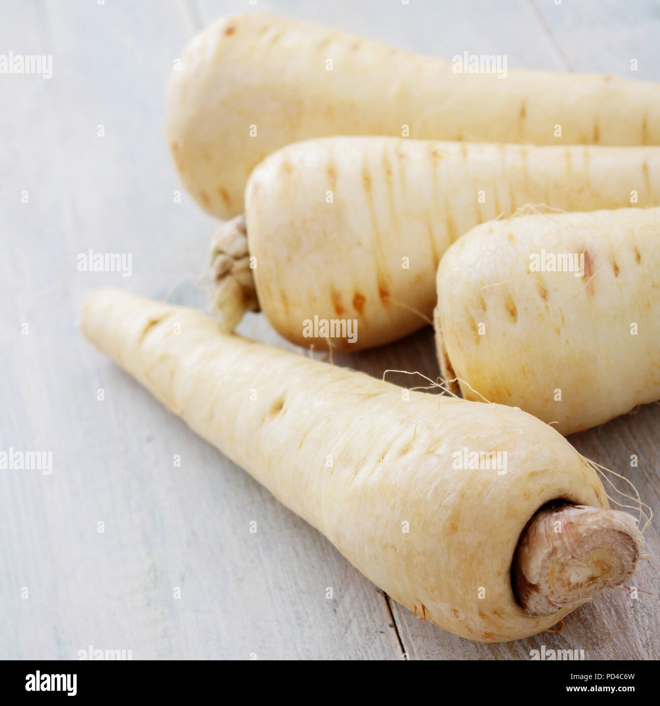 preparing fresh parsnips Stock Photo - Alamy