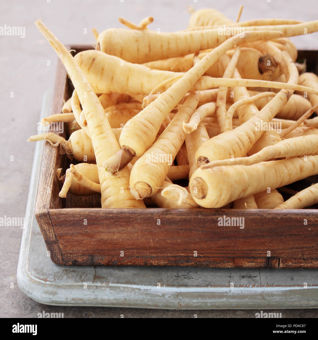 preparing fresh parsnips Stock Photo - Alamy