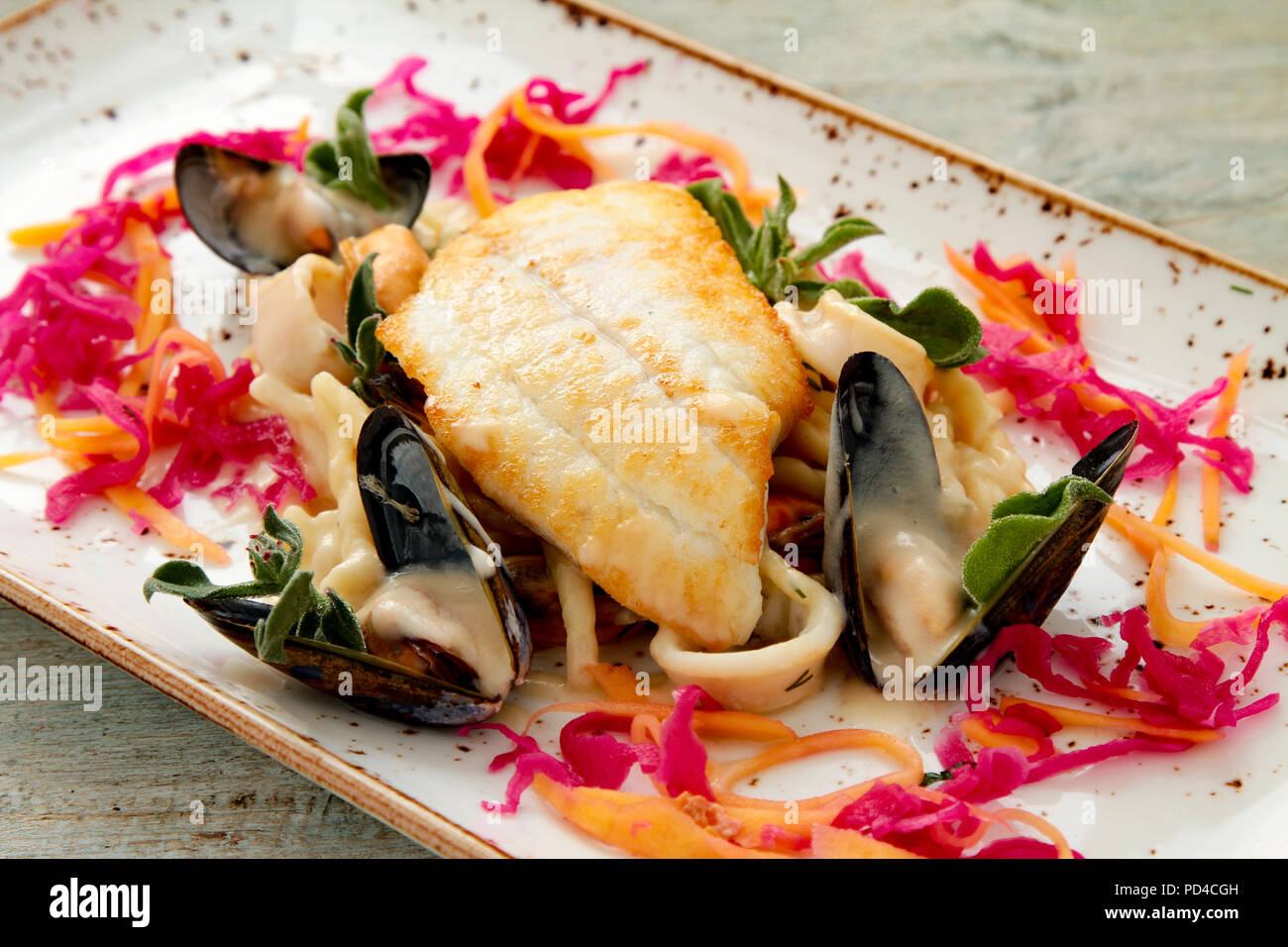 plated fish meal Stock Photo - Alamy
