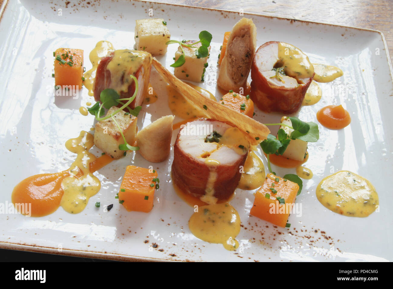 plated chicken main meal Stock Photo - Alamy