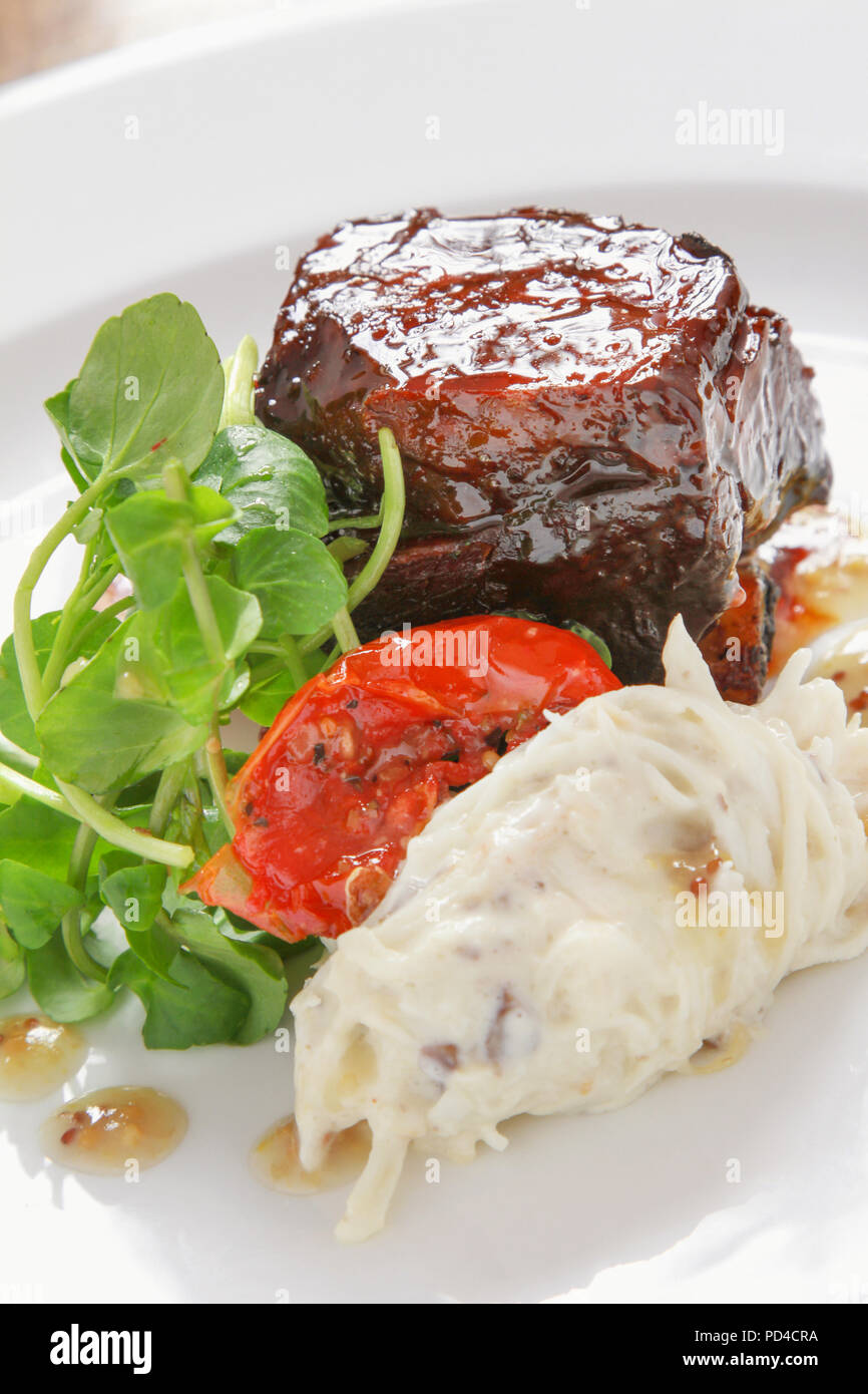 plated beef rib meal Stock Photo - Alamy