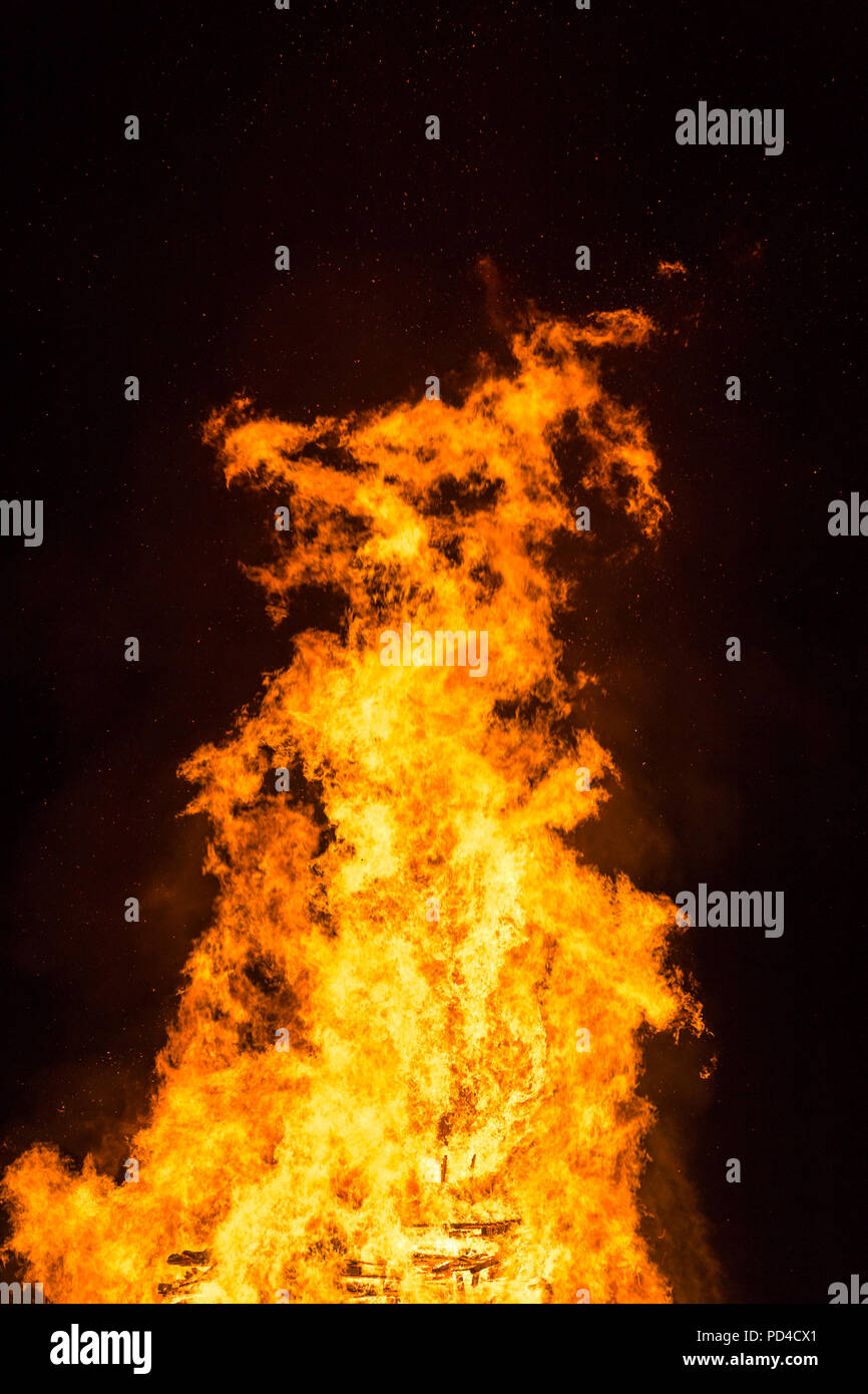 Fire and flames with sparks and ember on black background Stock Photo ...