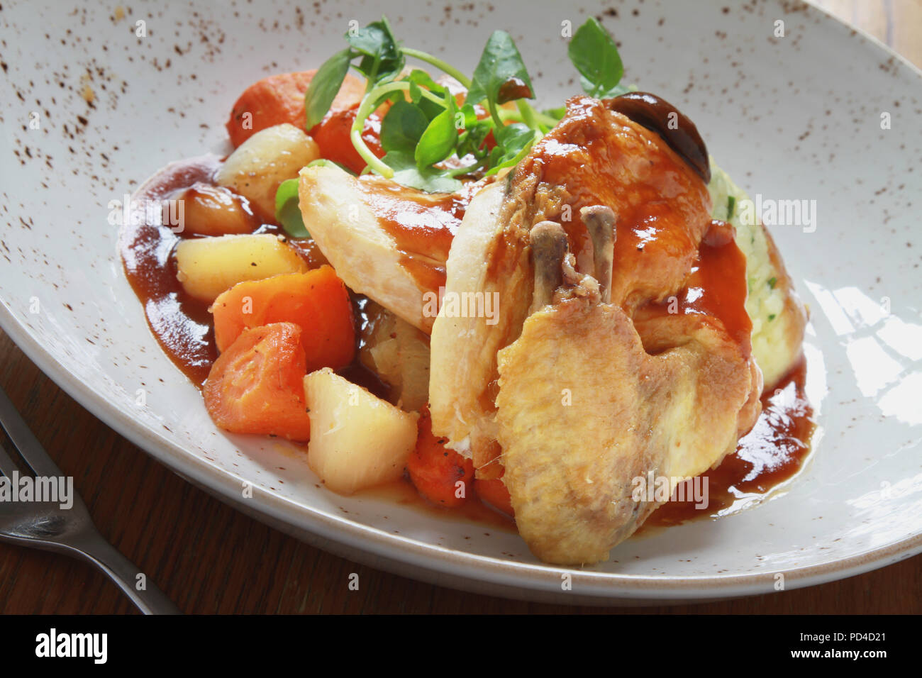 plated chicken main meal Stock Photo - Alamy