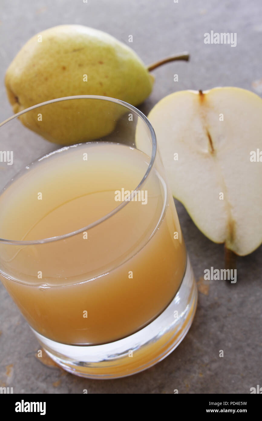 making pear juice Stock Photo - Alamy