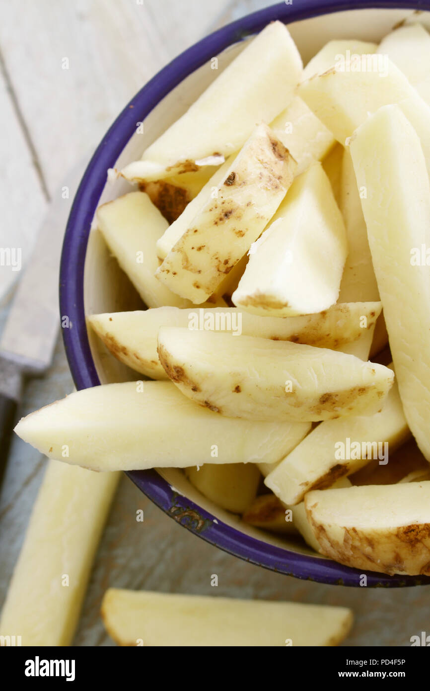 Chipping potatoes hi-res stock photography and images - Alamy