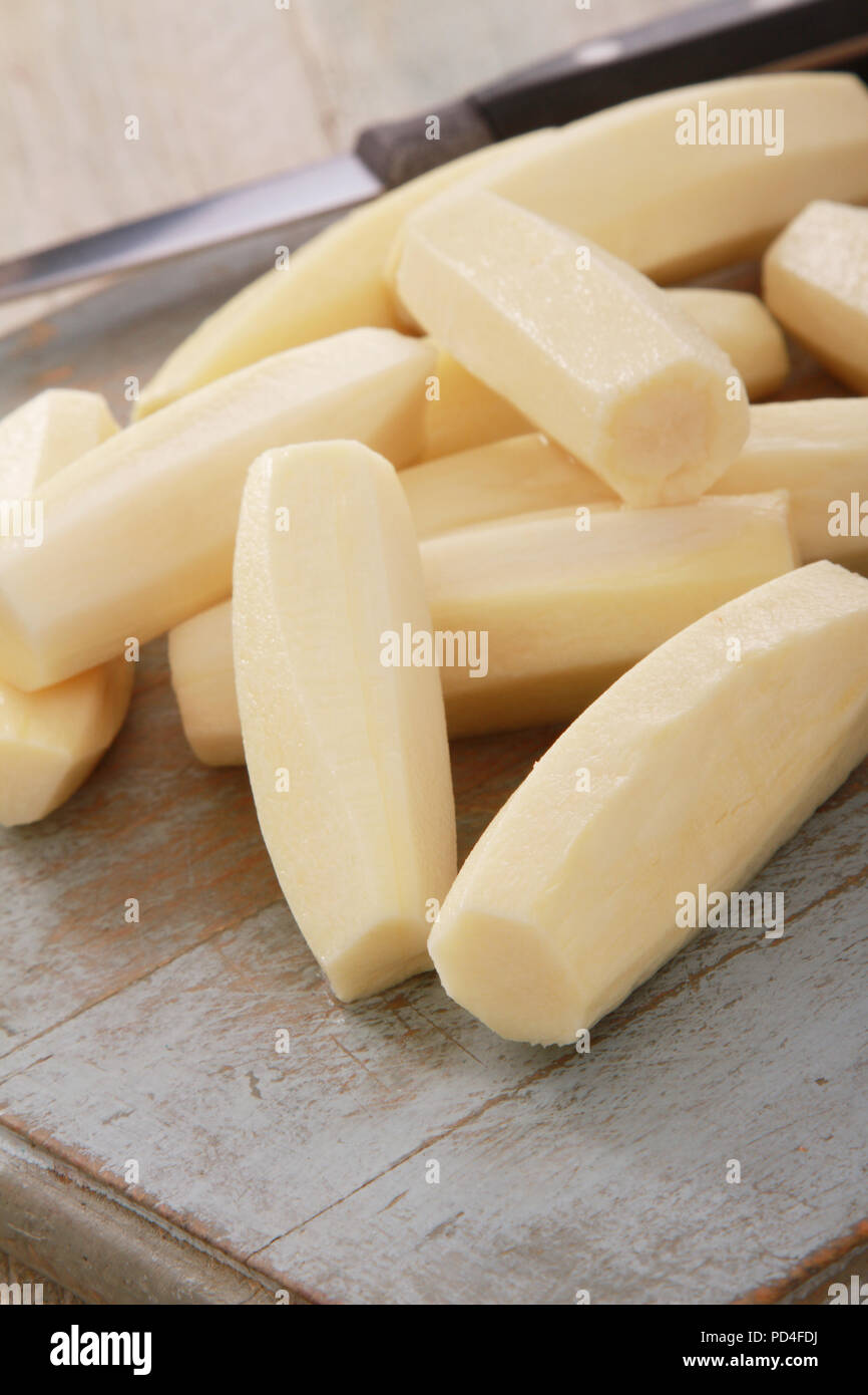 preparing fresh parsnips Stock Photo - Alamy