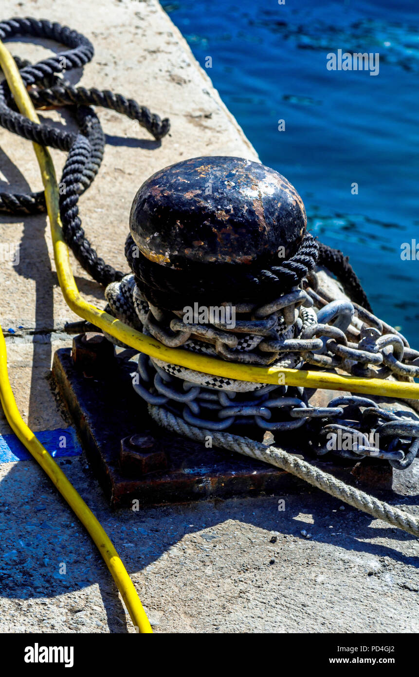 mooring post on the waterfront in a small marina, element for mooring ...