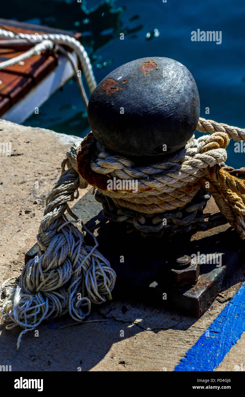mooring post on the waterfront in a small marina, element for mooring ...