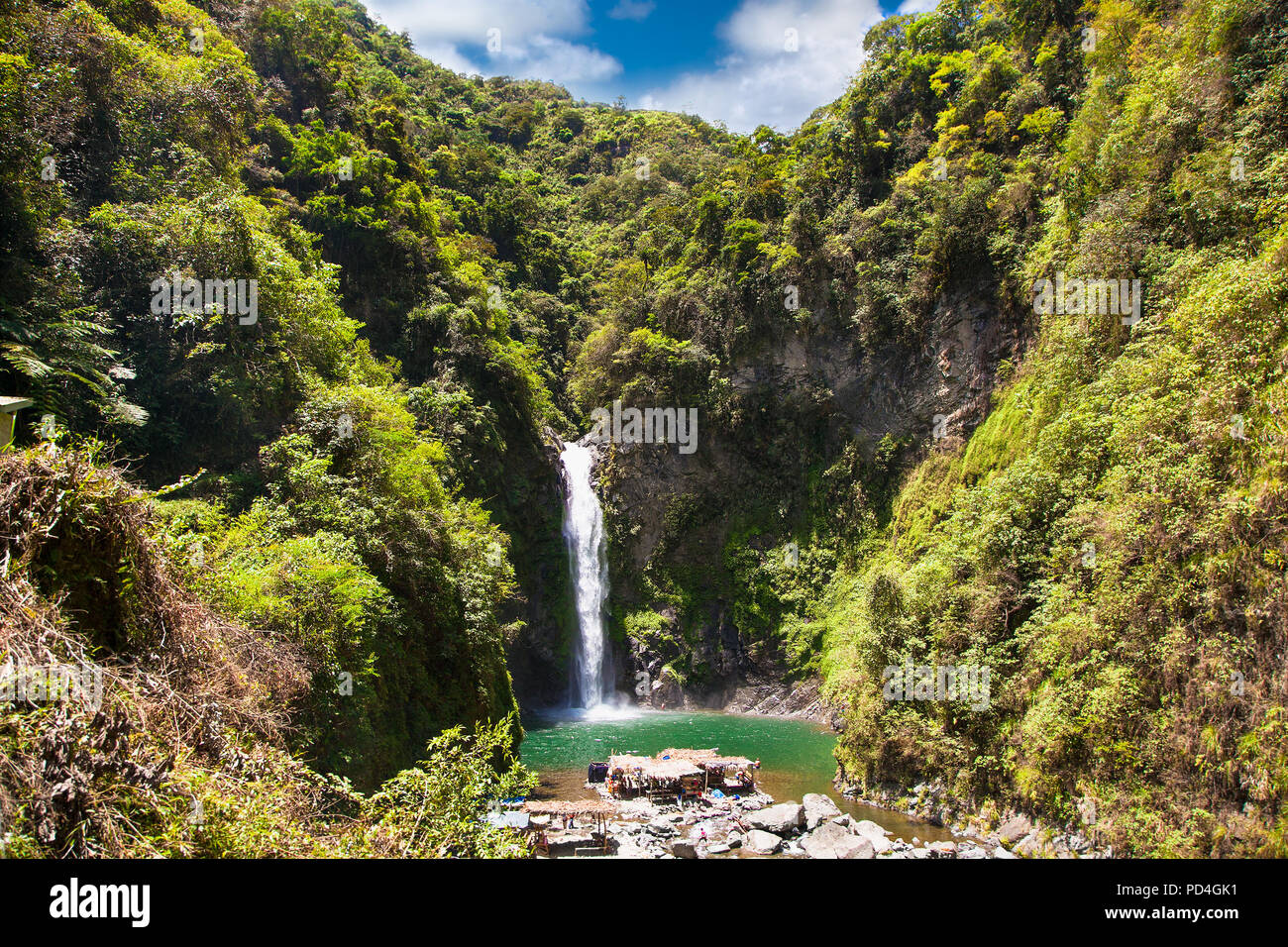 Waterfall at mountain Gorge in Batad, province Banaue. North ...