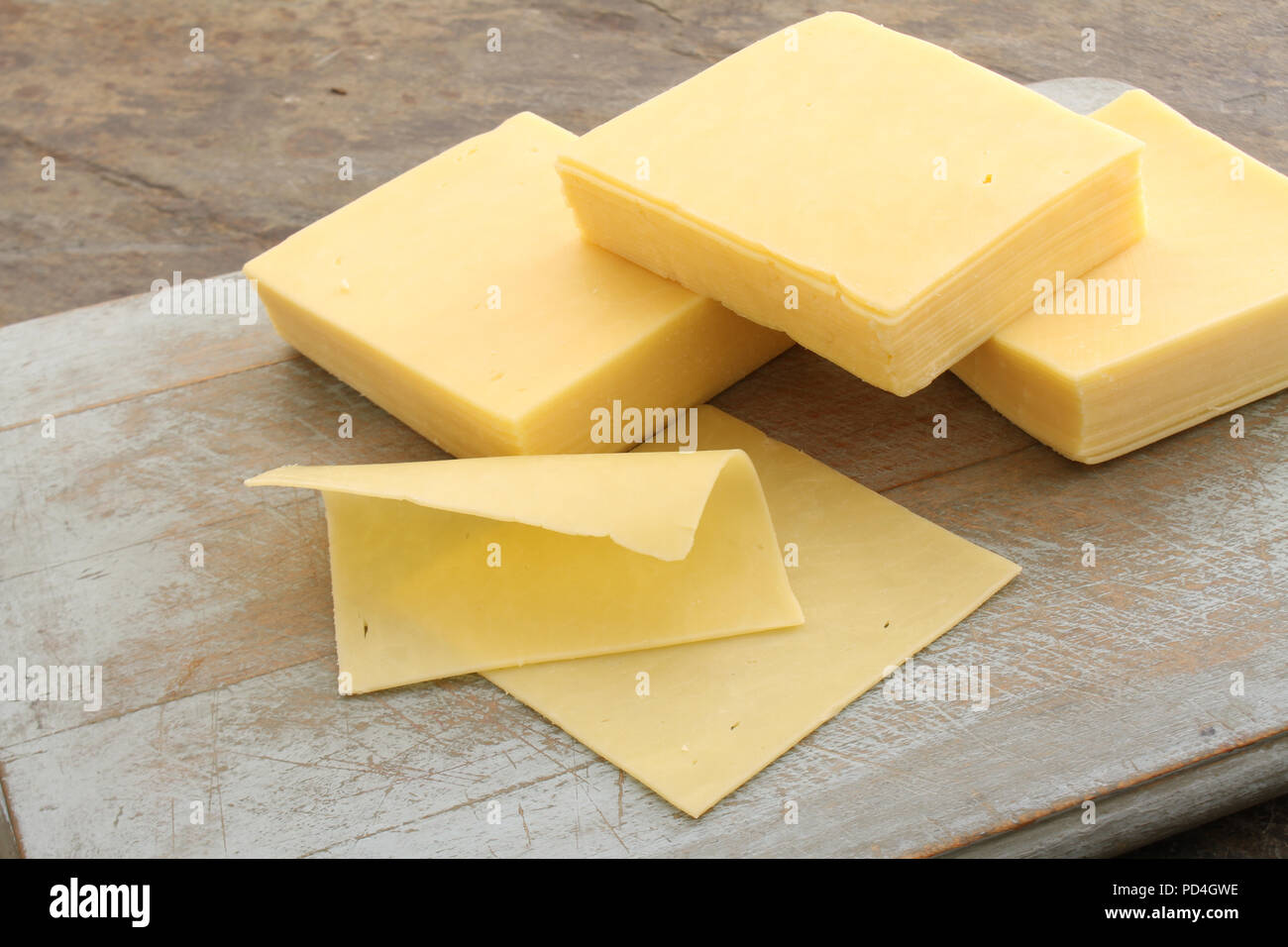 sliced cheese portions Stock Photo - Alamy