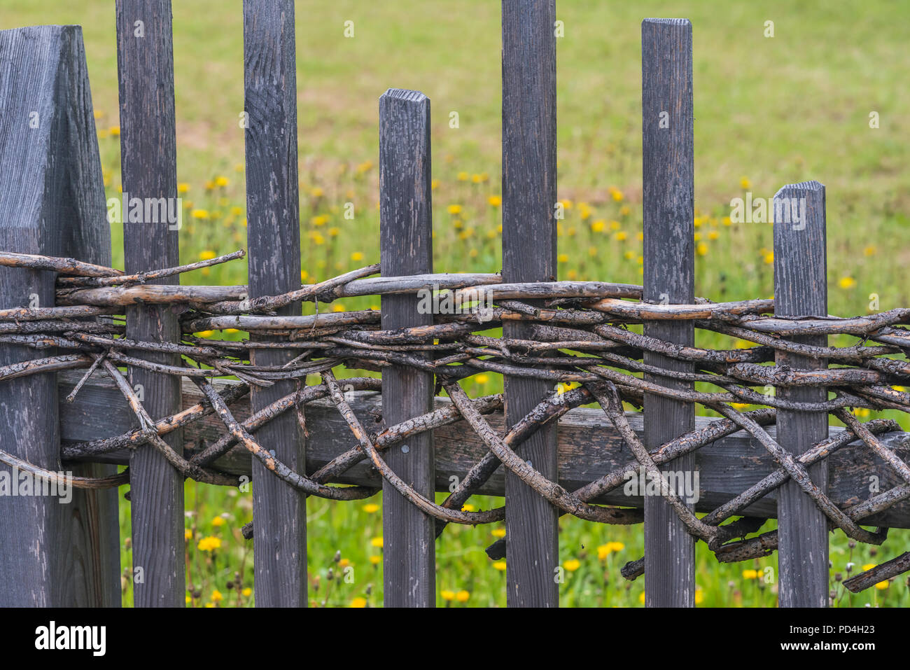 Things Tyrolean with decorative chestnut paling fence on a meadow ...