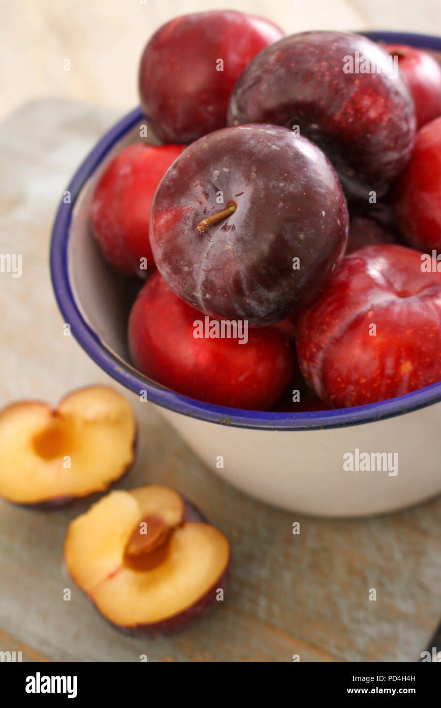 preparing fresh plums Stock Photo - Alamy