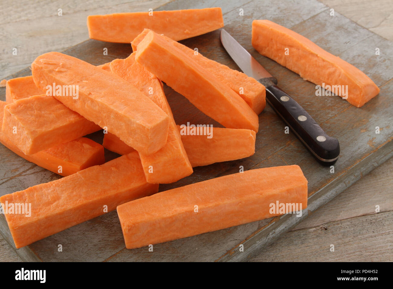uncooked chipped potatoes Stock Photo - Alamy