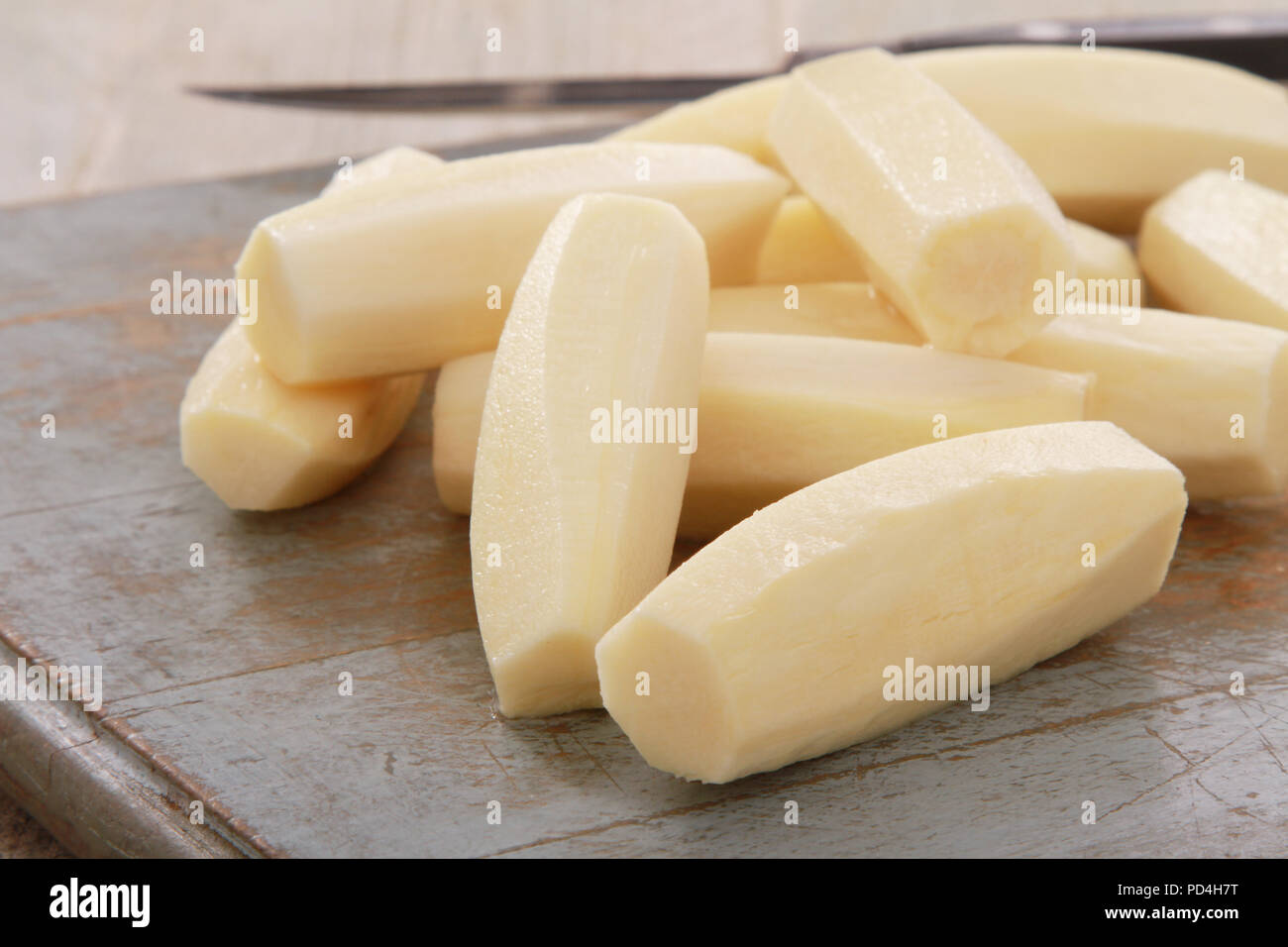 preparing fresh parsnips Stock Photo - Alamy