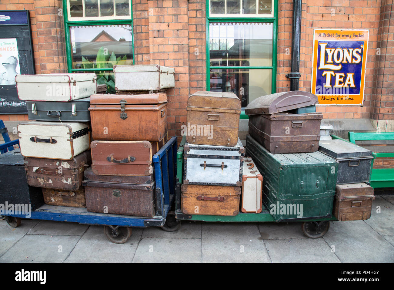 Baggage on an old railway station trolley hi-res stock photography and ...