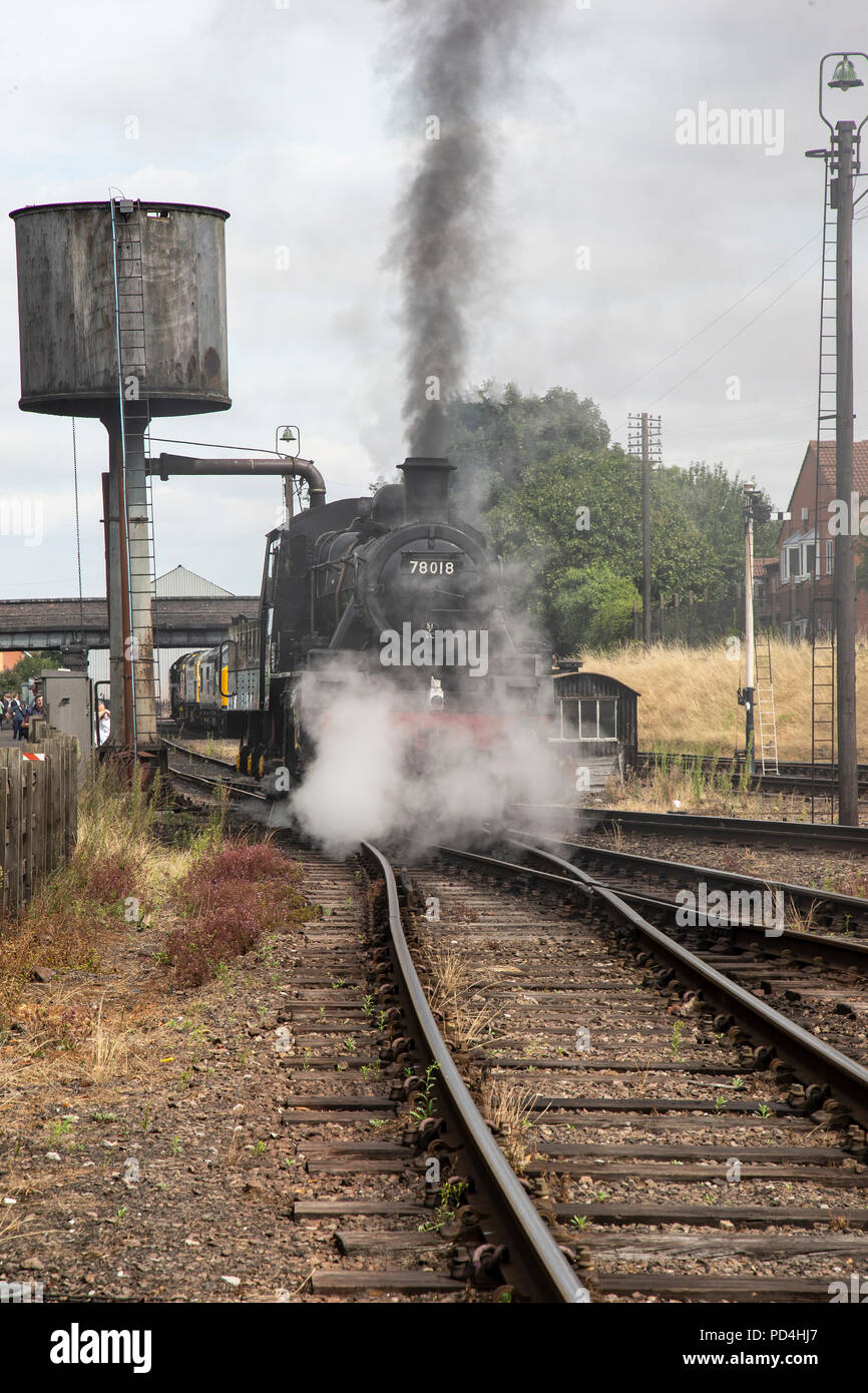 Steam train filling water hi-res stock photography and images - Alamy