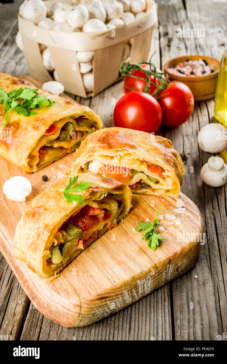 Vegetable savory strudel, homemade autumn baking, with tomatoes, bell ...