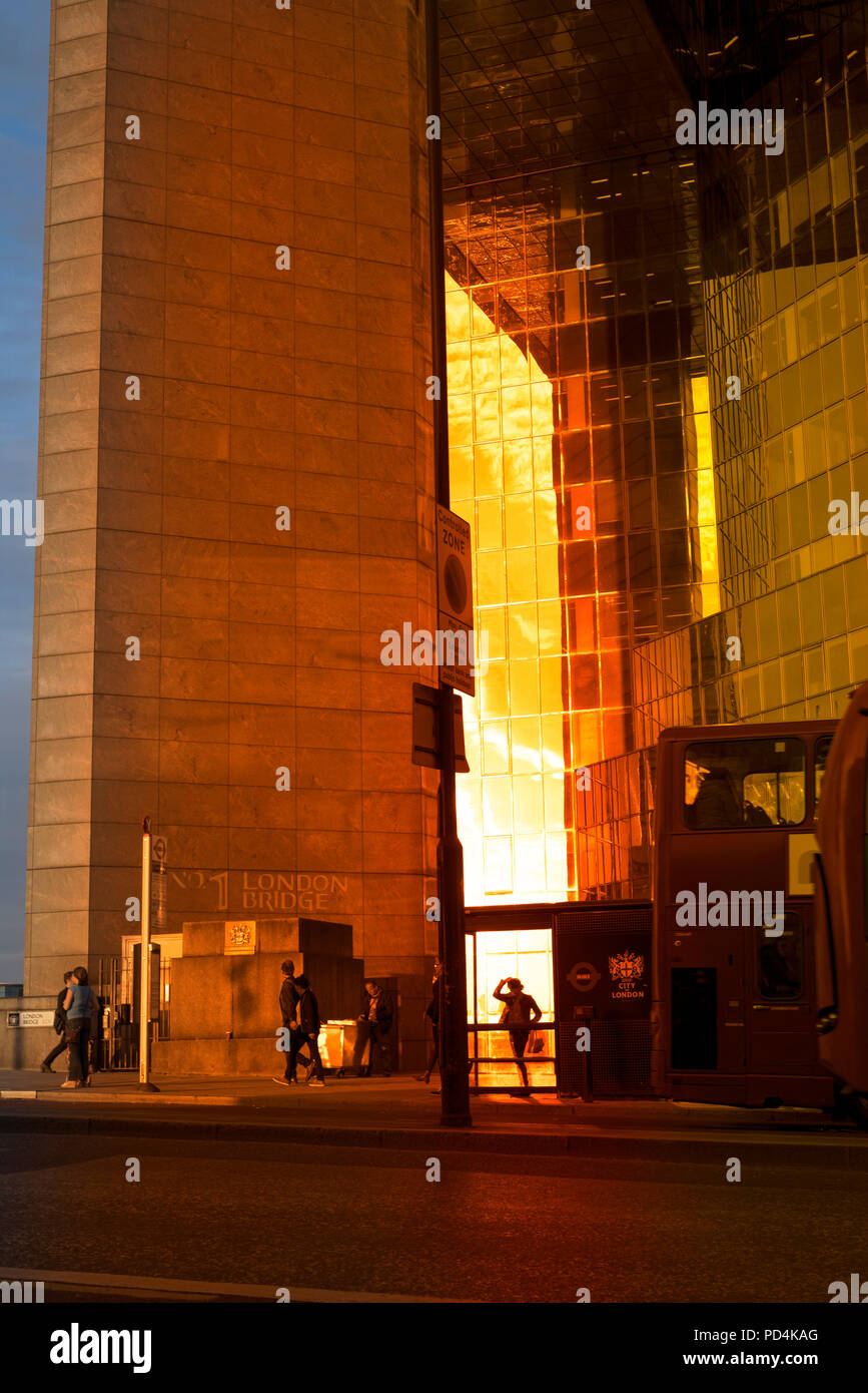 silhouette of a woman at iconic number 1 london bridge building in the ...