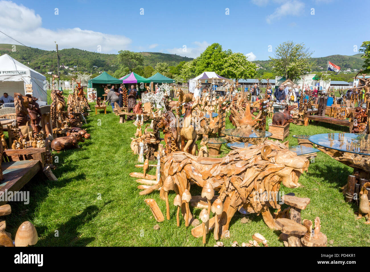 An assortment of wooden animal sculptures made from reclaimed wood at ...