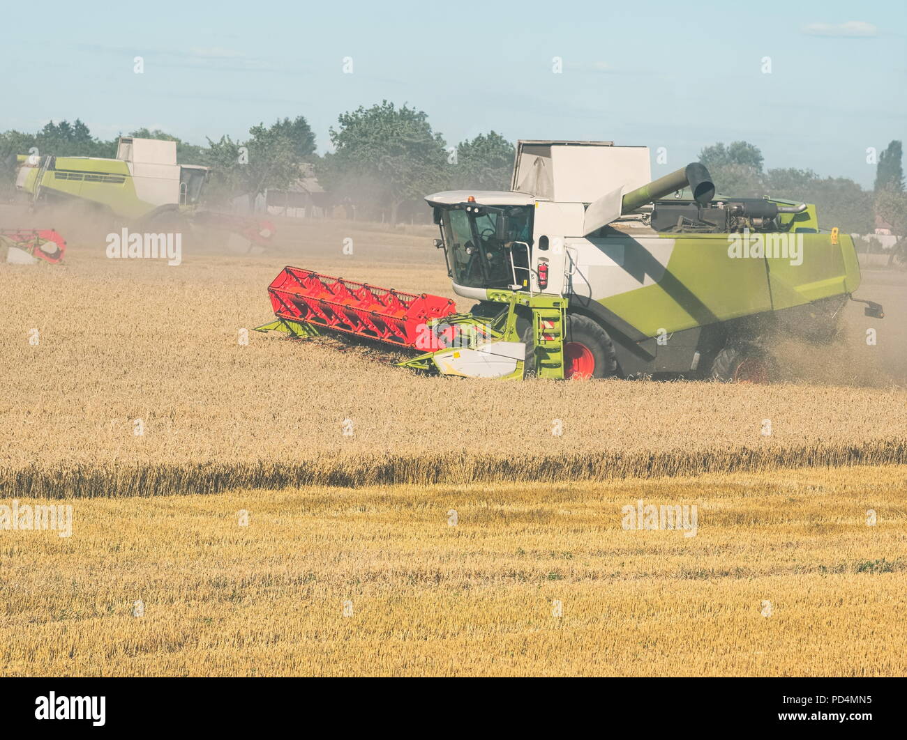 Many harvesters wheat harvest straw hi-res stock photography and images ...