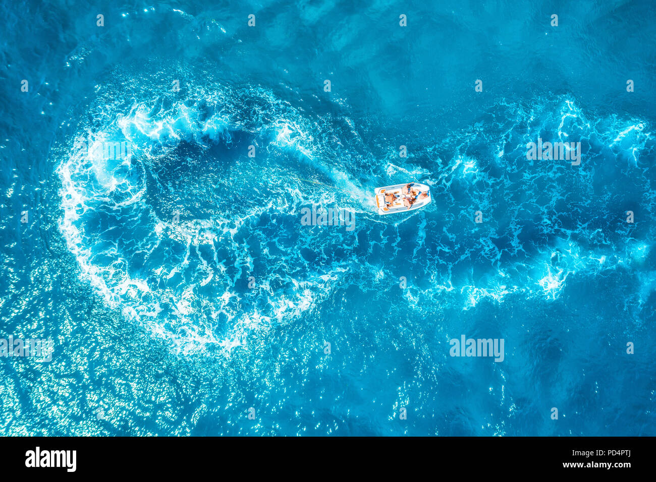 Speed motorboat on the sea in Europe. Aerial view of floating boat with ...