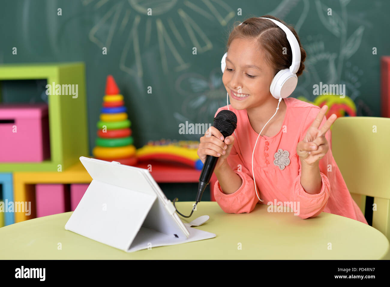 girl singing karaoke Stock Photo - Alamy