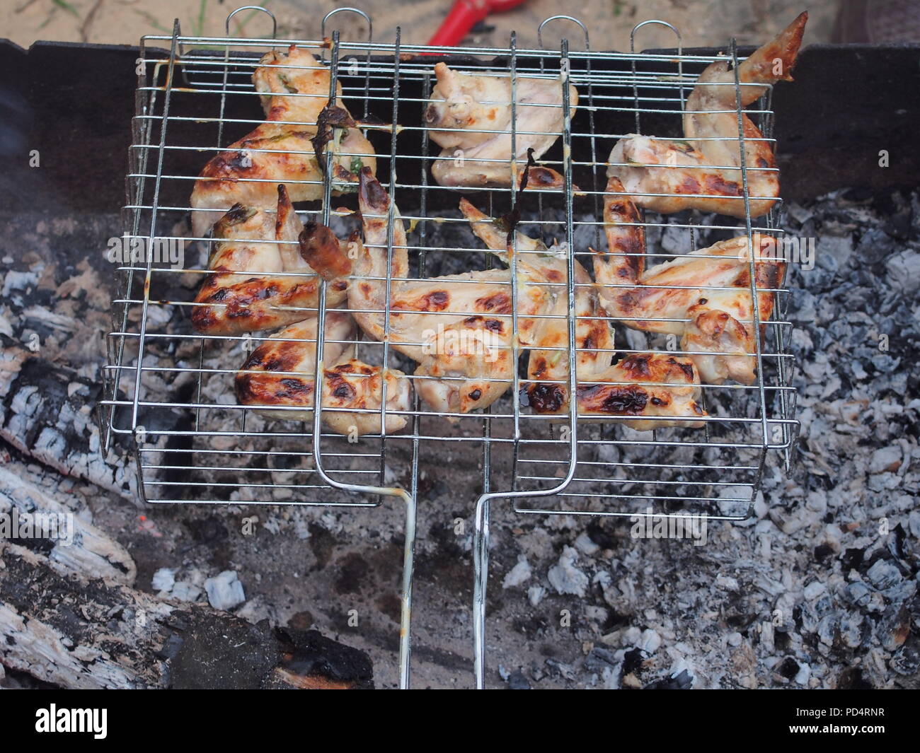 Chicken wings on the grill hi-res stock photography and images - Alamy