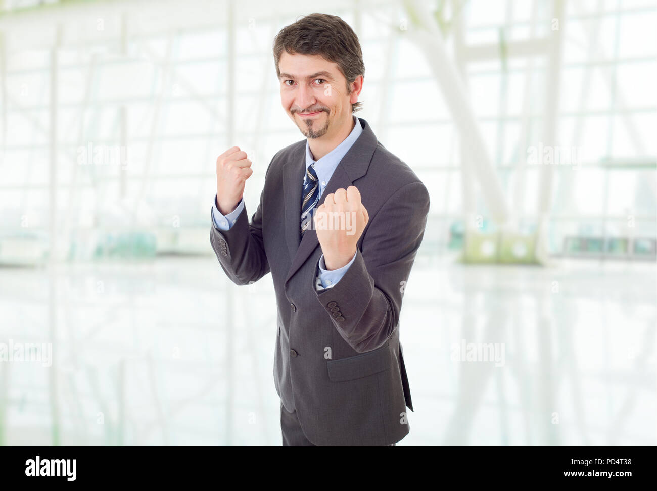 business man with open arms winning, at the office Stock Photo - Alamy