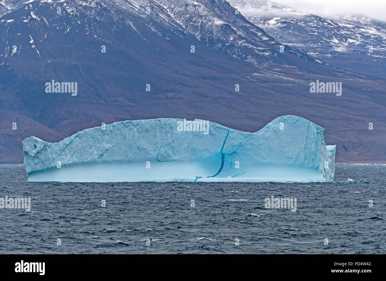 Blue Iceberg along a Remote Coast of Greenland along the Nugssuaq ...