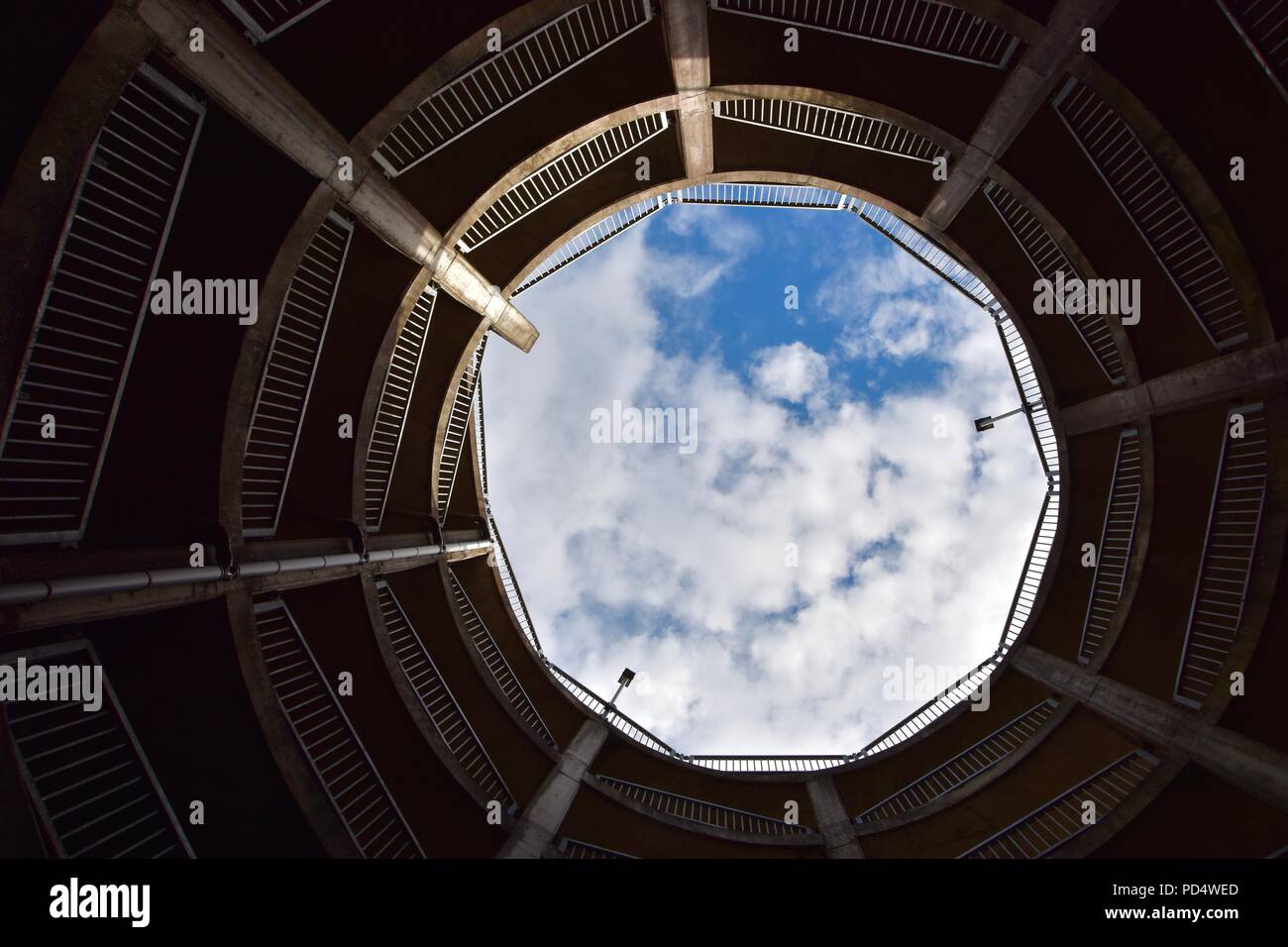 Looking straight up to the sky from the bottom of a building, unique ...