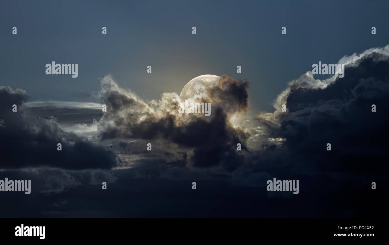 Full moon behind illuminated hi-res stock photography and images - Alamy