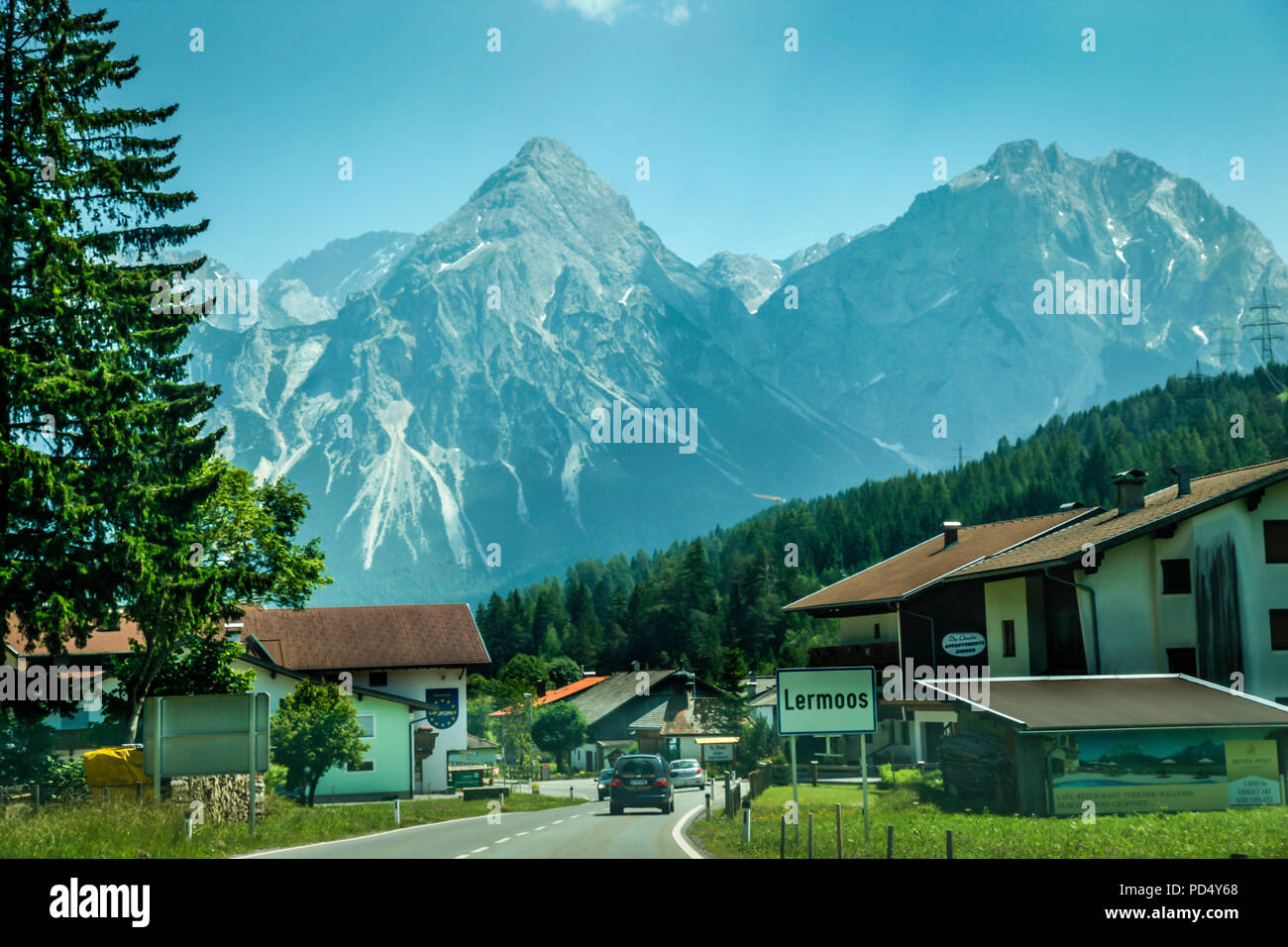 View of the Zugspitze mountains in Austrian alps in summer with holiday ...